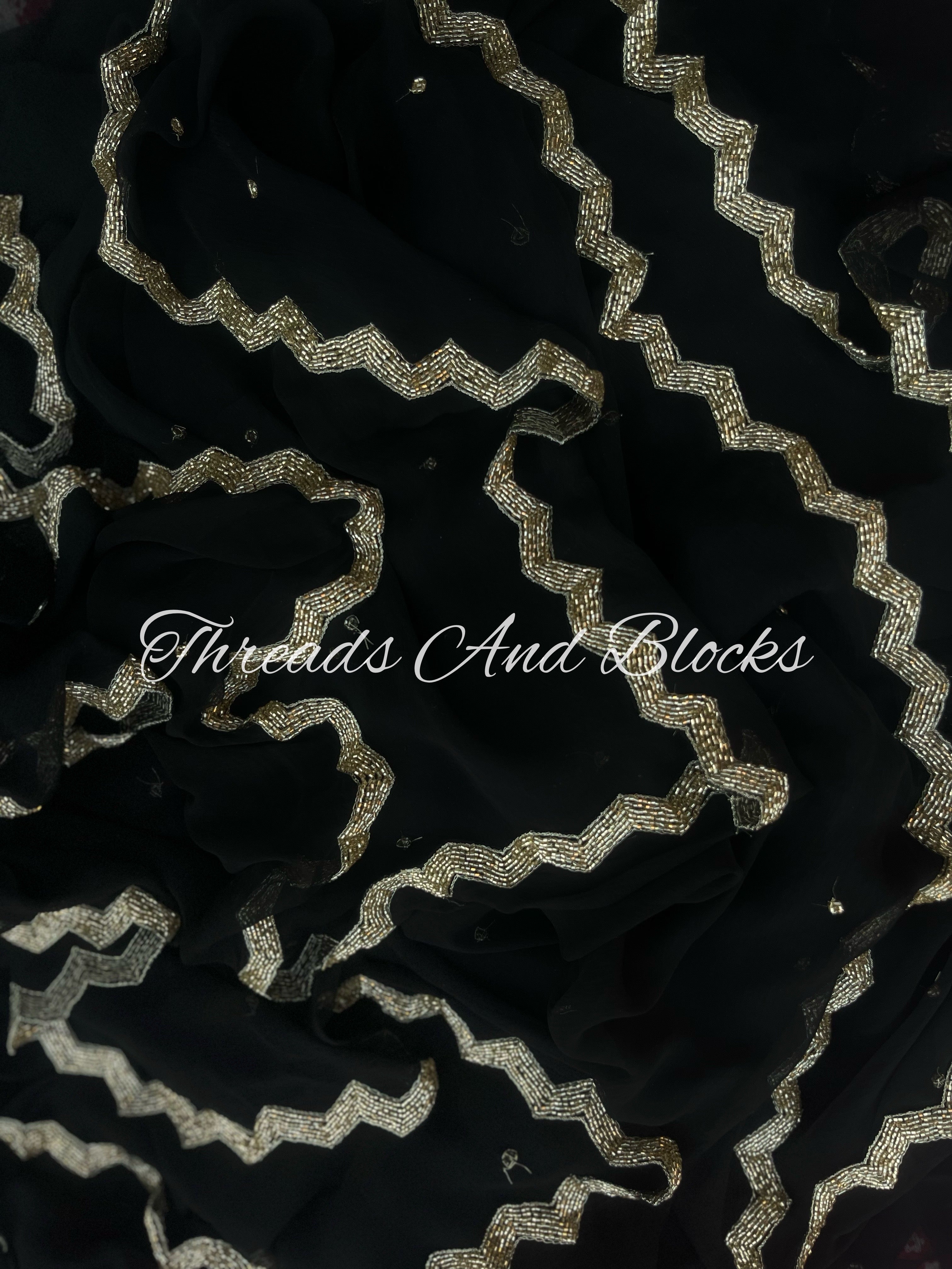 Black Cutwork Border Saree – Threads & Blocks